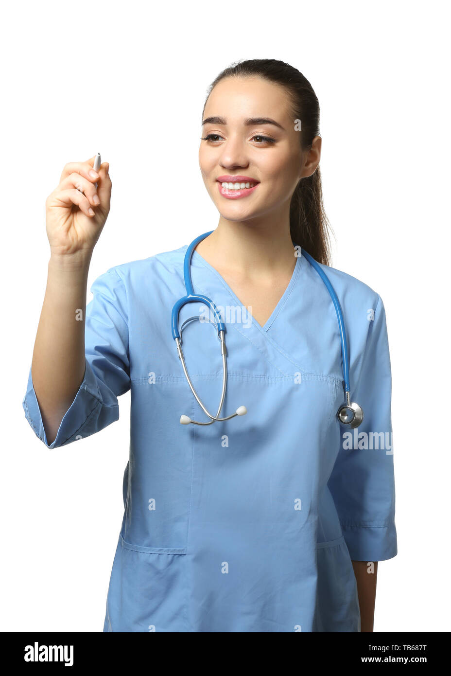 Female doctor writing on virtual screen against white background Stock ...