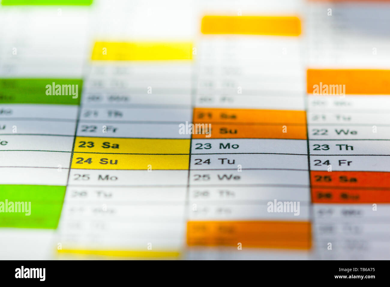 Closeup of dates on calendar page Stock Photo - Alamy