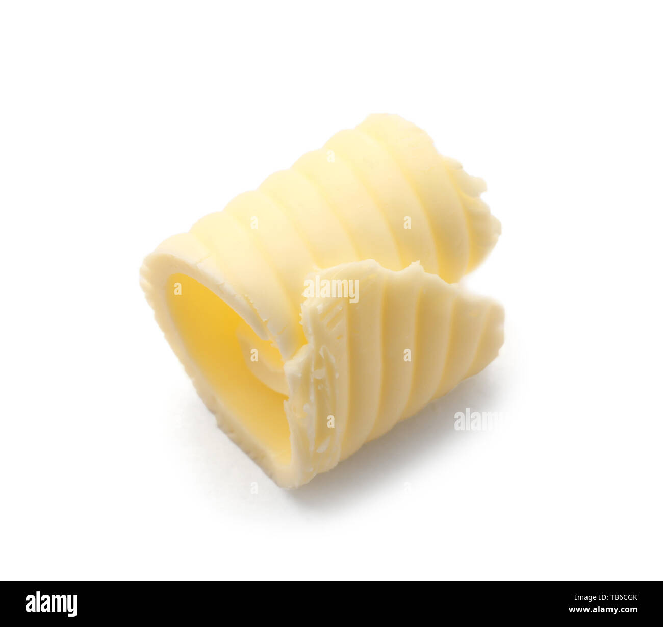 Butter curl on white background Stock Photo - Alamy
