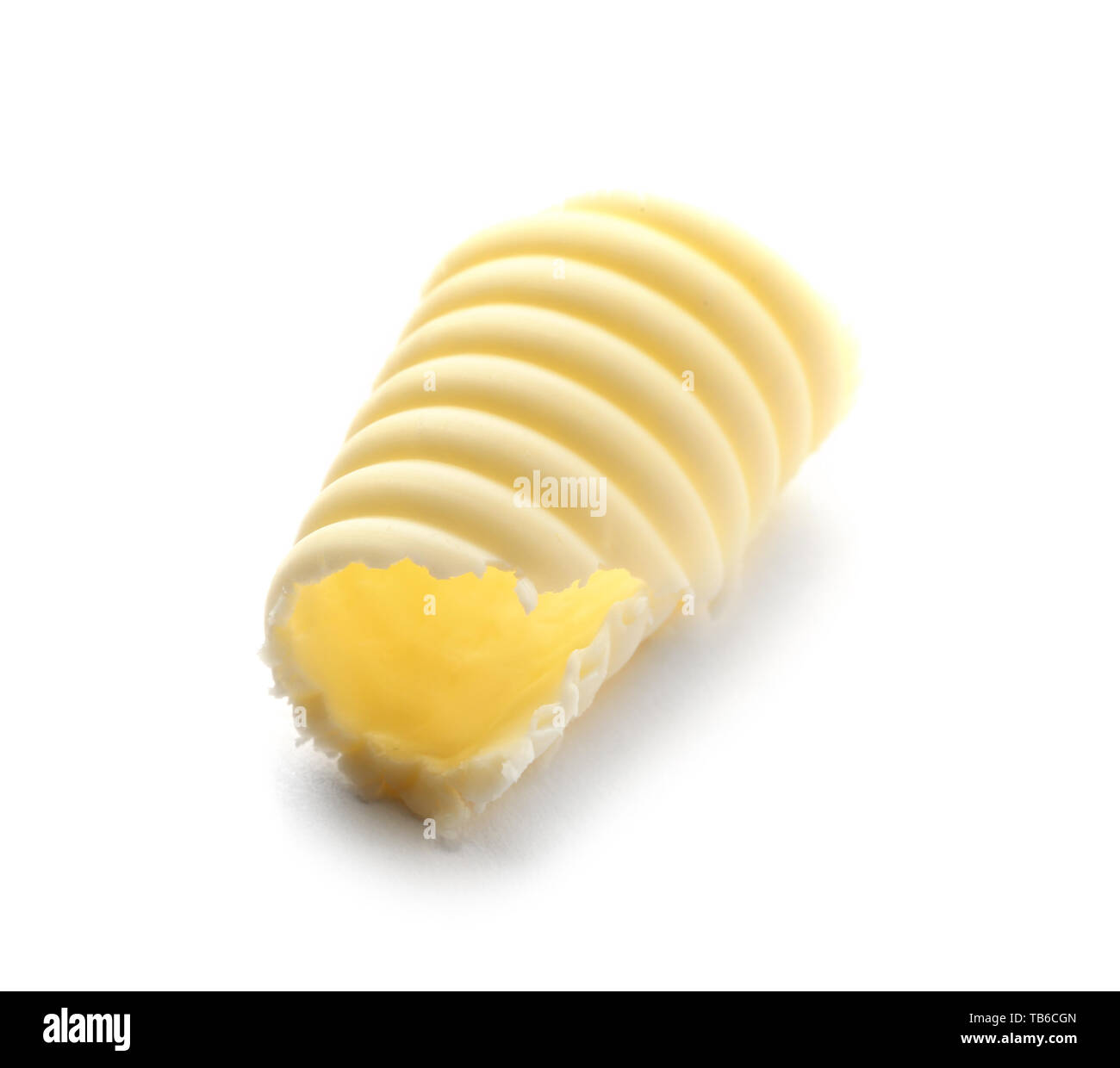 Butter curl on white background Stock Photo - Alamy