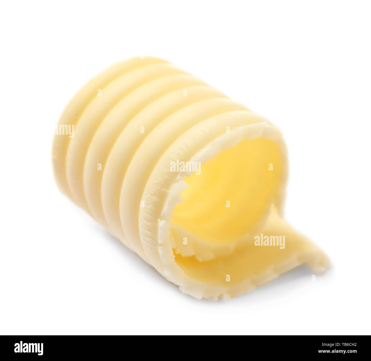 Butter curl on white background Stock Photo - Alamy