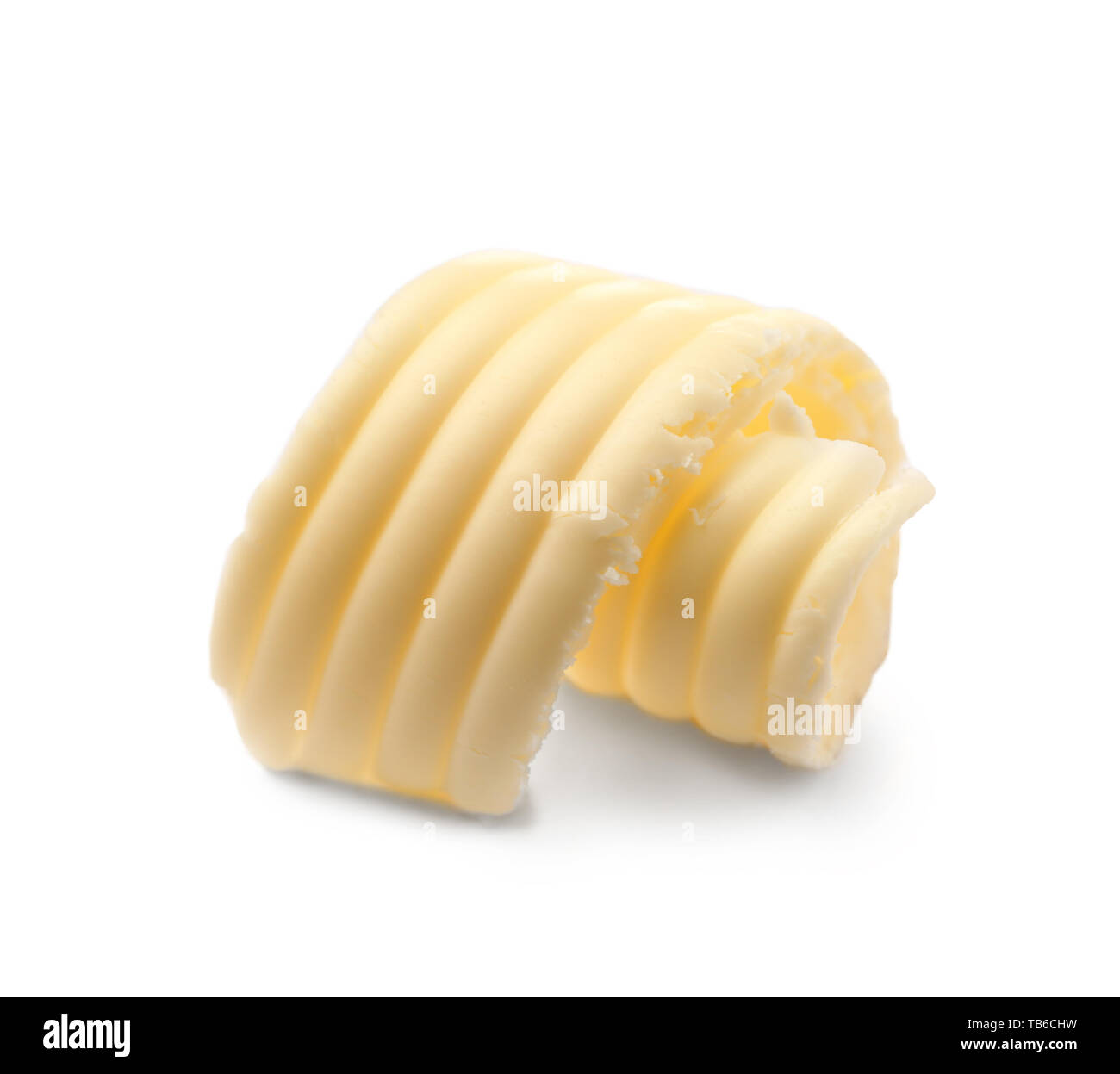 Butter curl on white background Stock Photo - Alamy