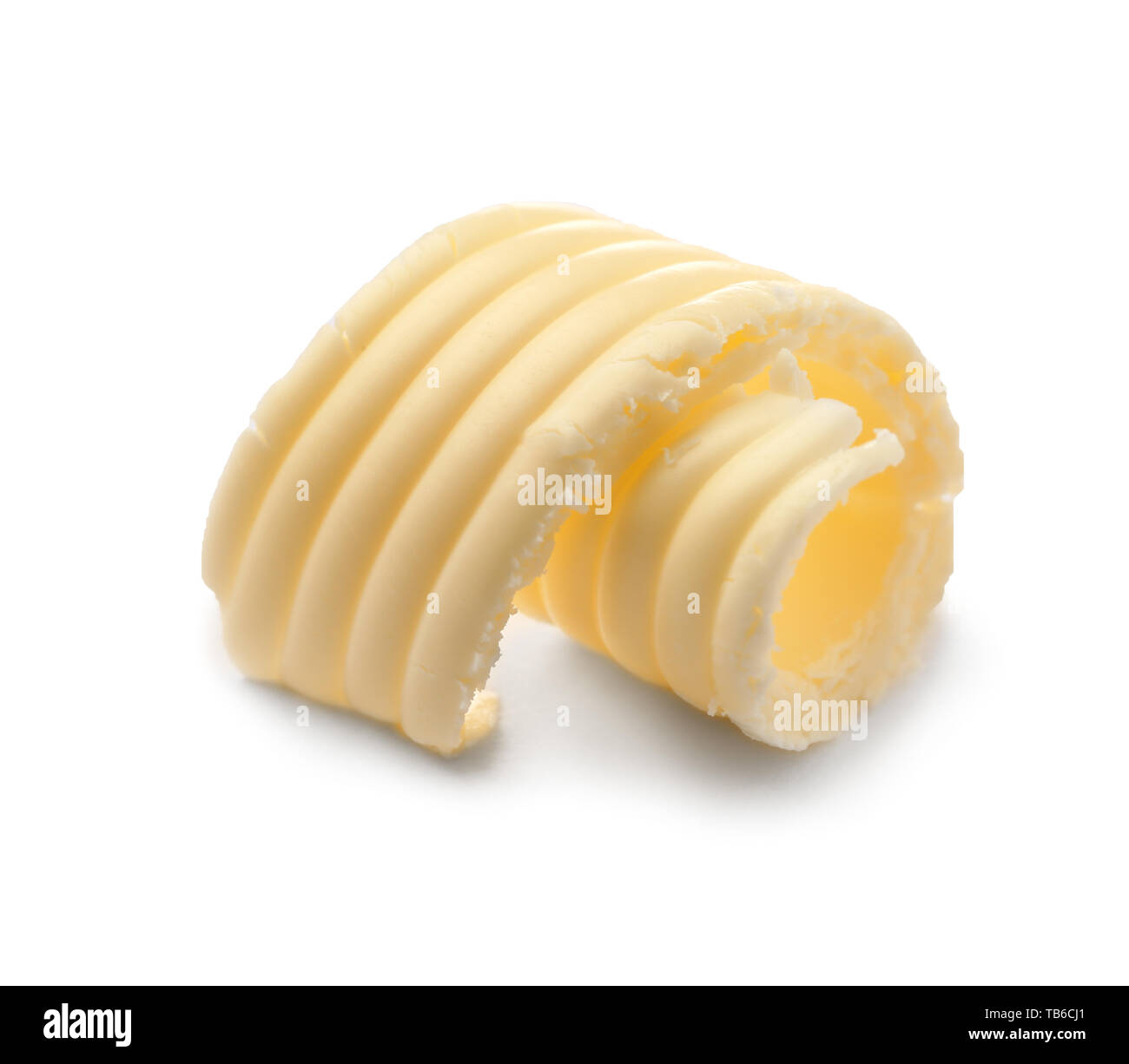 Butter curl on white background Stock Photo - Alamy