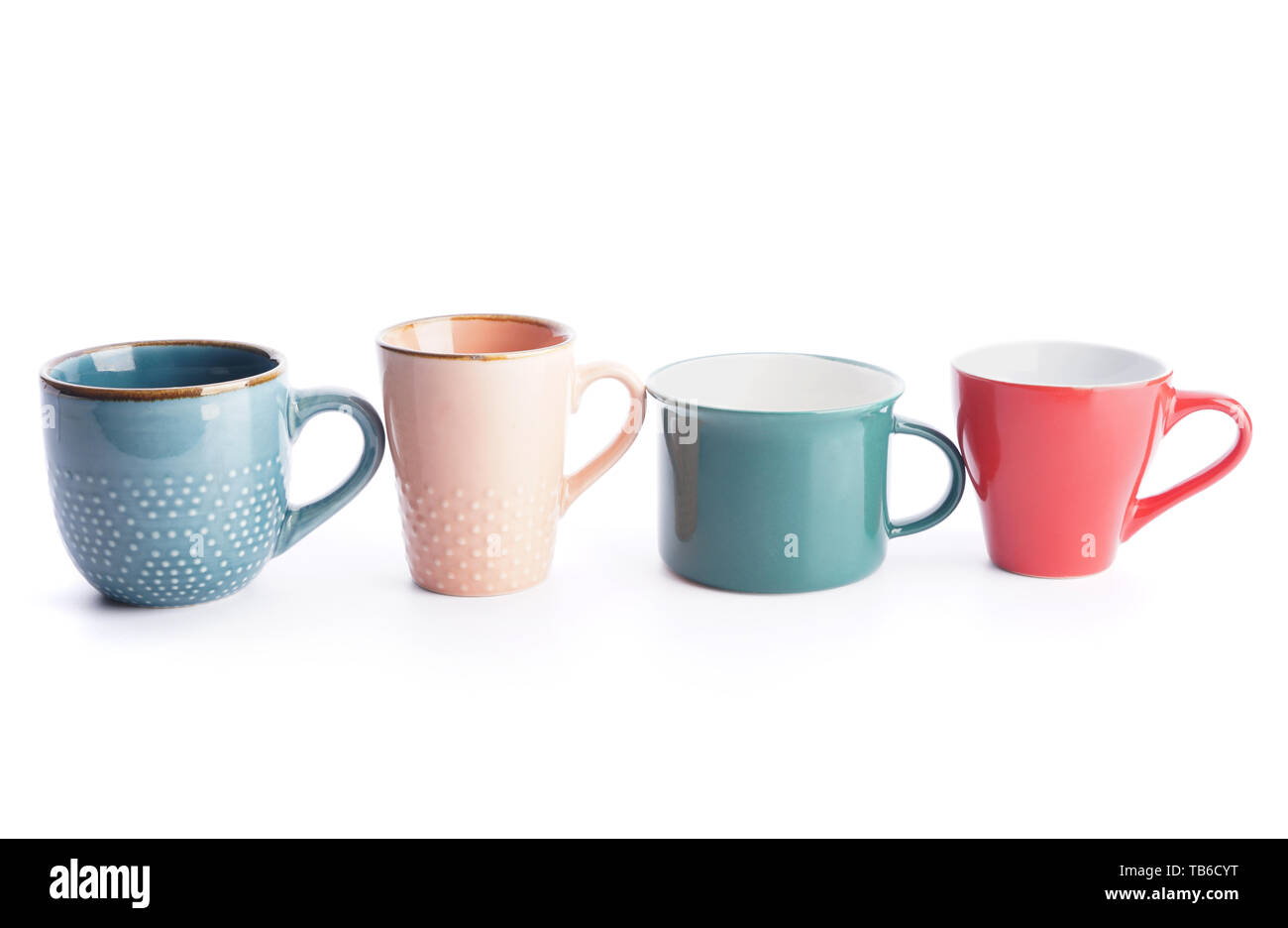 Colorful empty cups on white background Stock Photo - Alamy