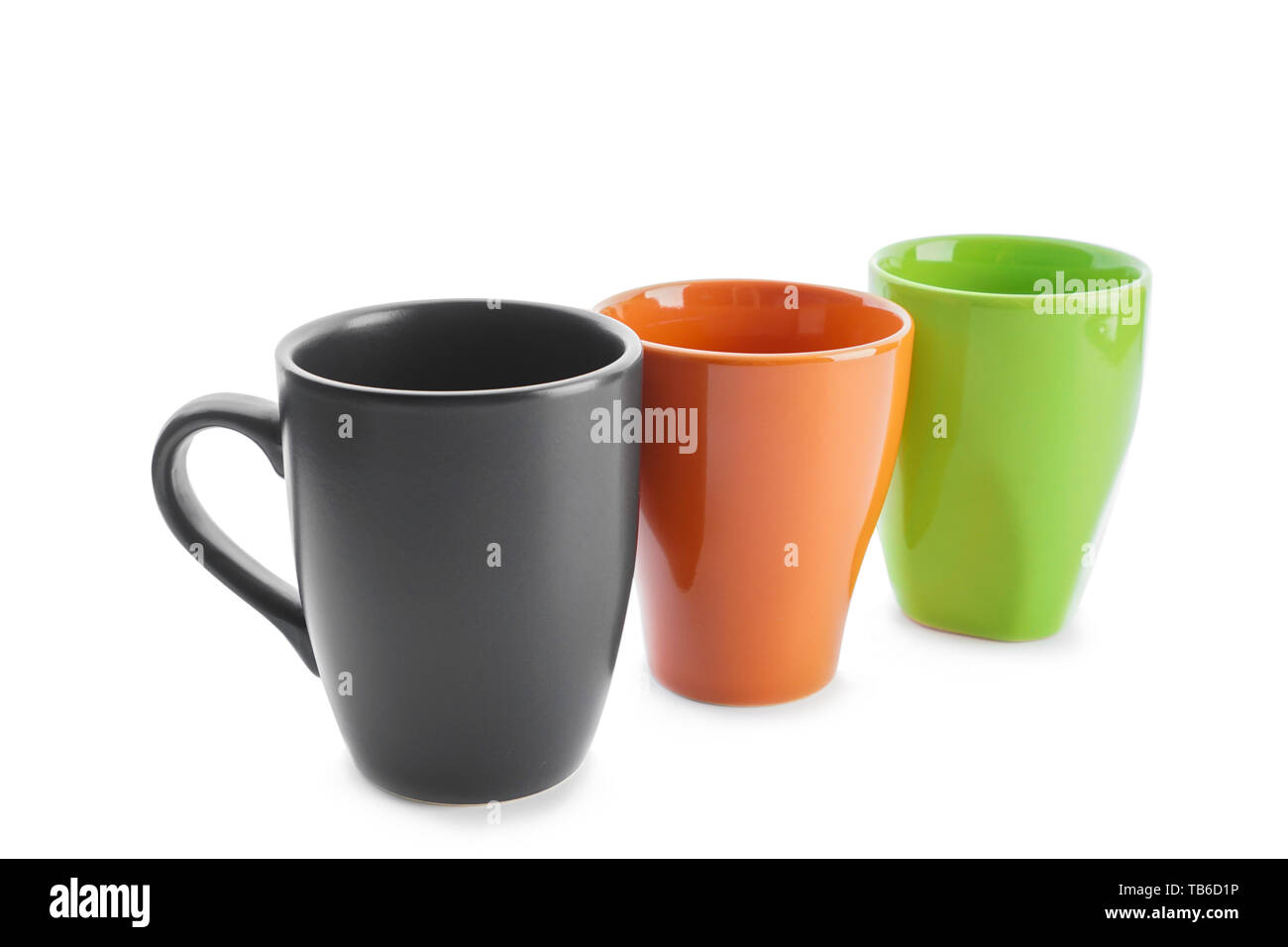 Colorful empty cups on white background Stock Photo - Alamy