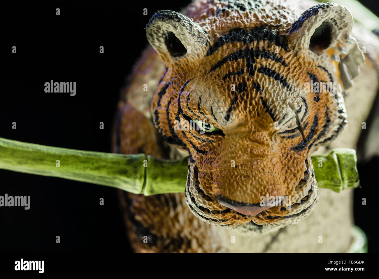 tiger plastic toy figure closeup view Stock Photo - Alamy