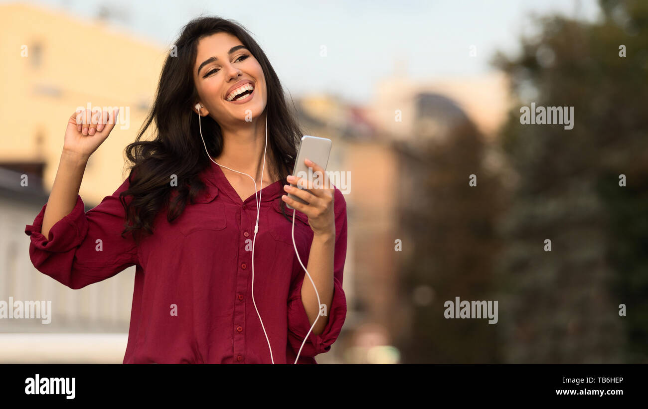 Happy girl dancing hi-res stock photography and images - Alamy