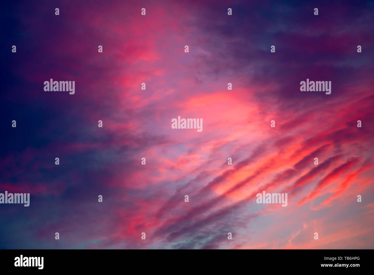 Sunset clouds sky background. Blue, purple and red clouds on dramatic ...