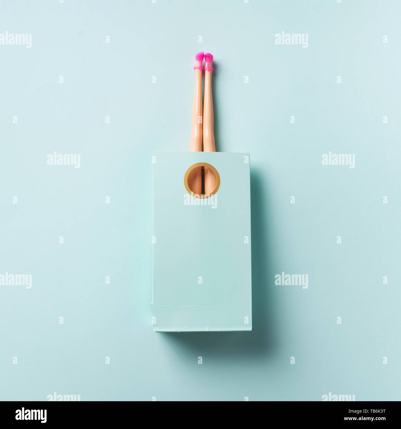 Female legs in paper shopping bag. Summer sales and discount concept ...
