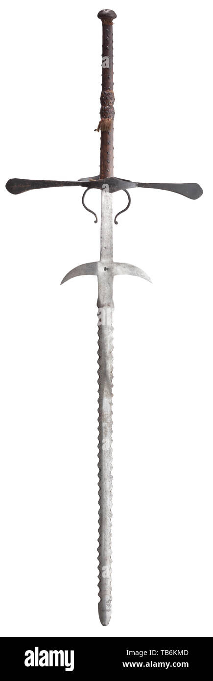 An Austrian two-hand flamberge, circa 1600, Blade with wavy edges ...