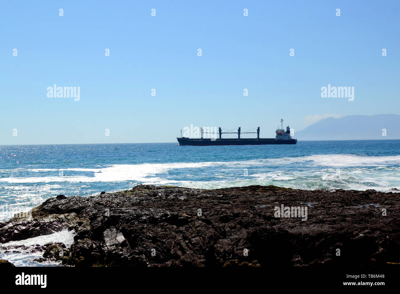 Cargo ship sailing off the coast of Antofagasta, Chile Stock Photo - Alamy