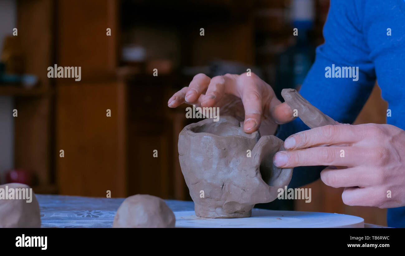 Professional male potter preparing clay hi-res stock photography and ...