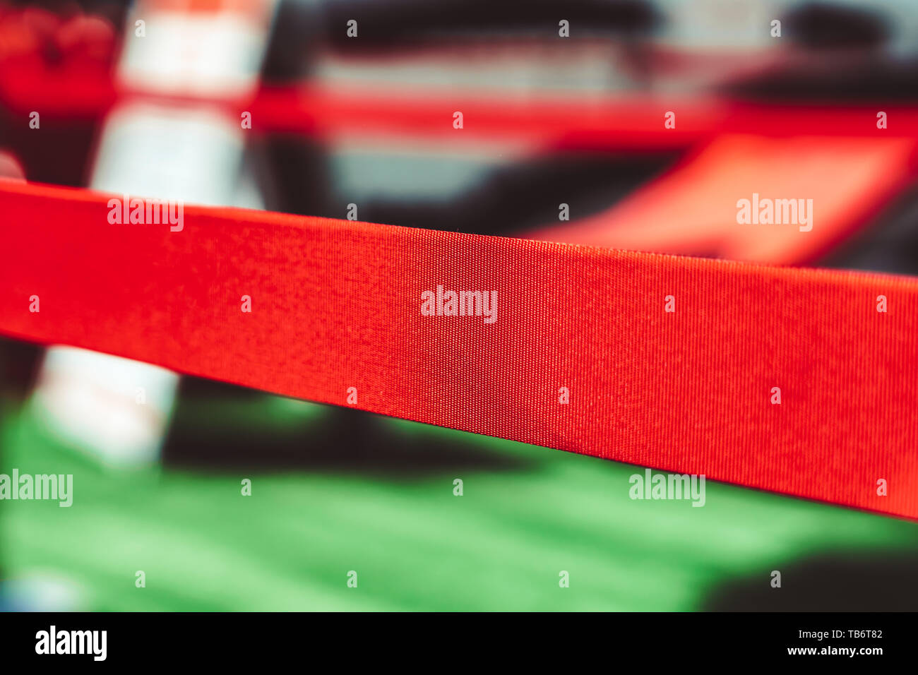 Red barrier at luxury club entrance, close up photo with selective ...