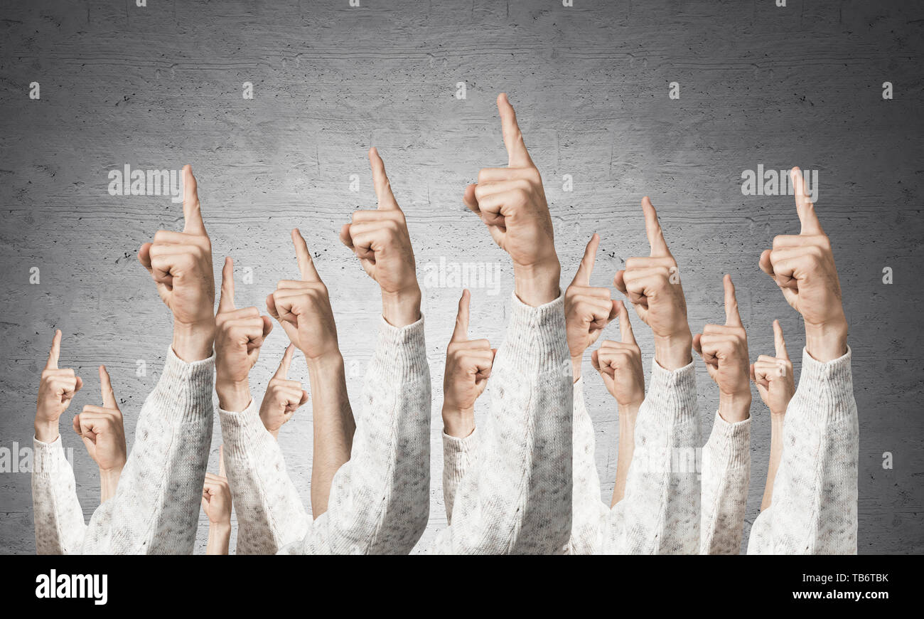 Row of man hands showing finger pointing gesture Stock Photo - Alamy