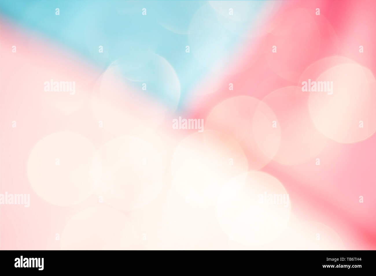 Abstract geometrical blurred background with sparkling light bokeh. Festive pink and turquoise ...