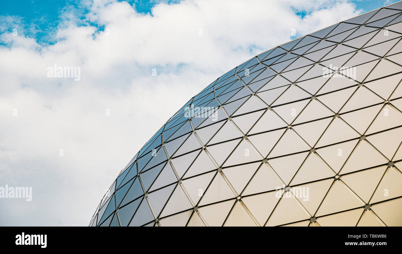 Modern design triangle and curved shape light from the clean blue sky ...