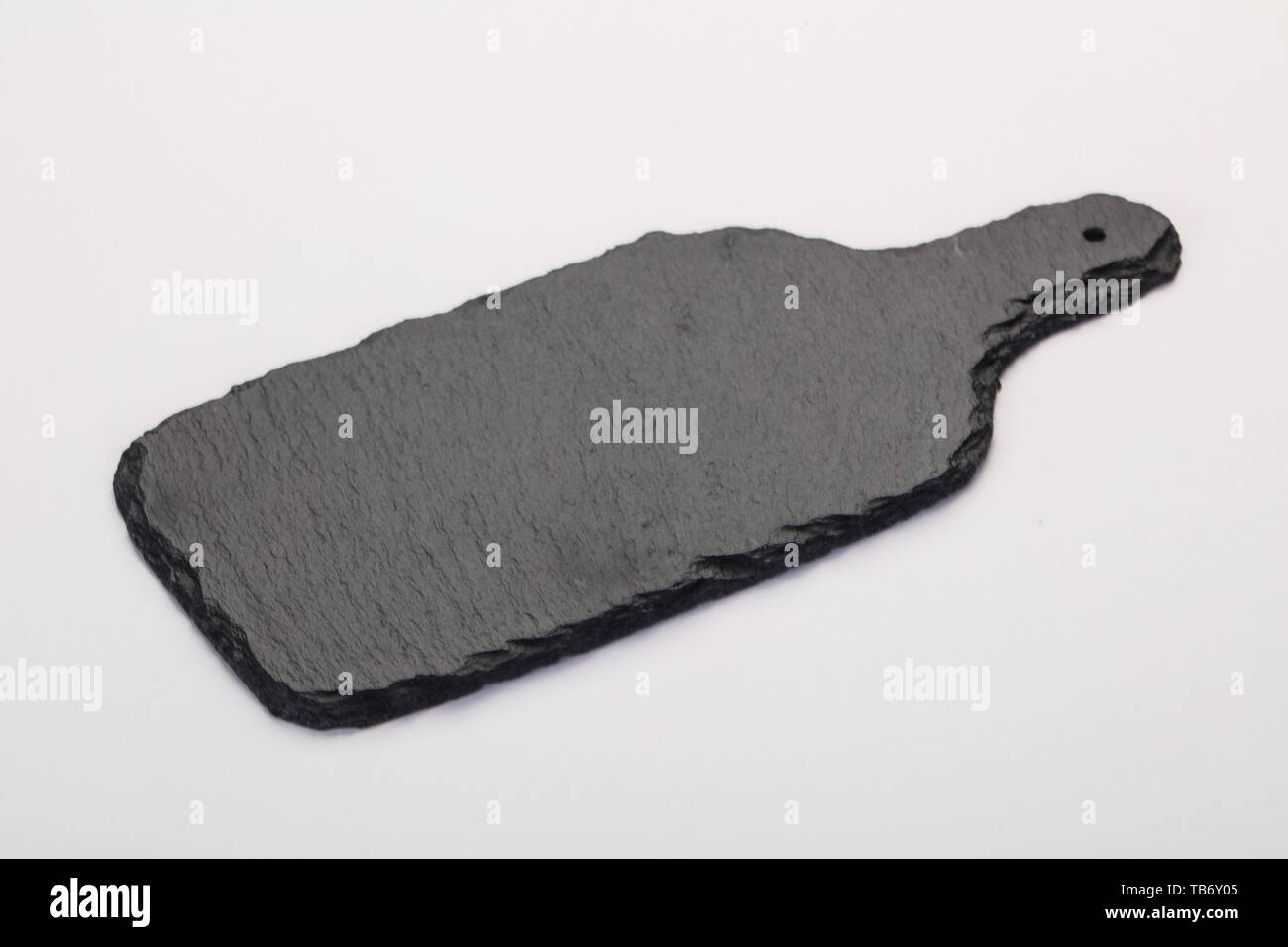 Stone board for serving dishes - kitchenware Stock Photo - Alamy