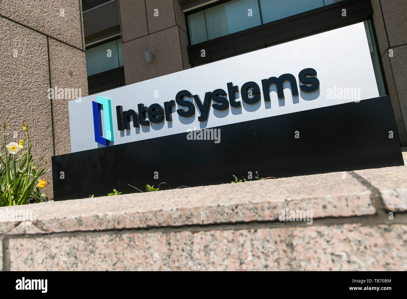 A logo sign outside of the headquarters of InterSystems Corporation in ...