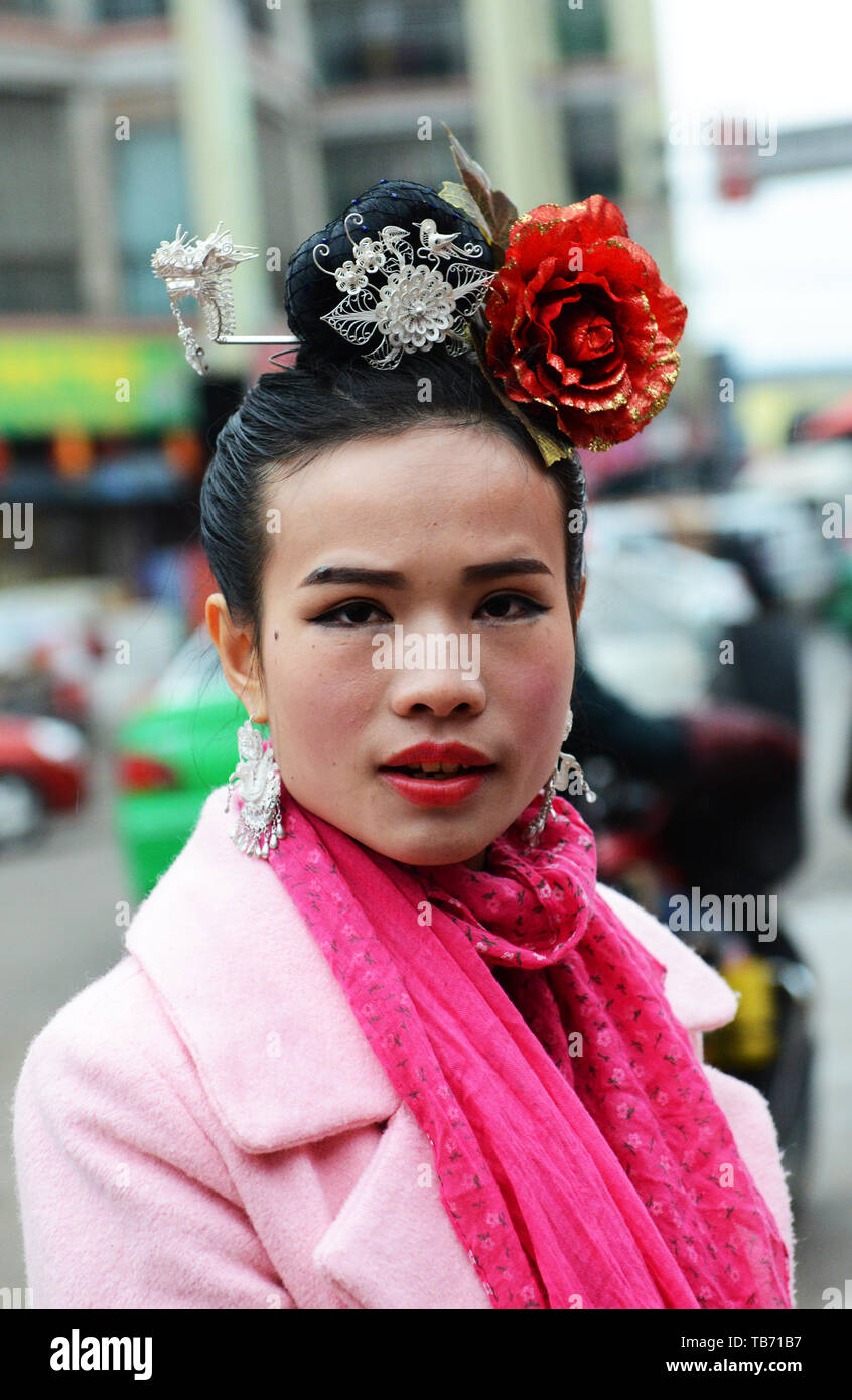 Portrait a beautiful Miao girl taken in Guizhou, China Stock Photo - Alamy