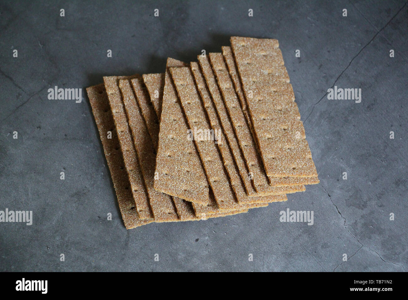 Thin crispbread from rye flour. Dietary nutrition. Close-up Stock Photo ...