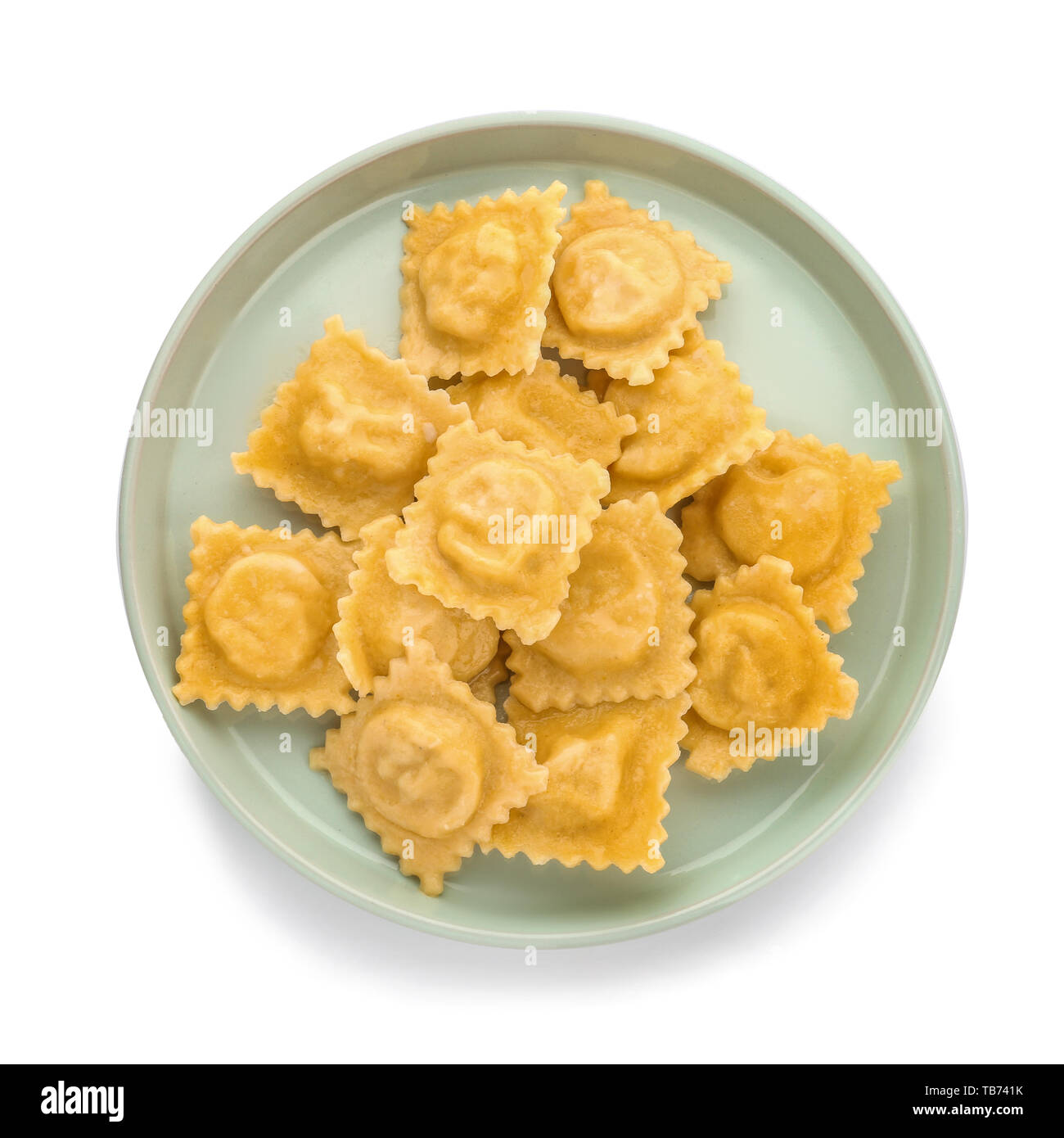 Plate with tasty ravioli on white background Stock Photo - Alamy