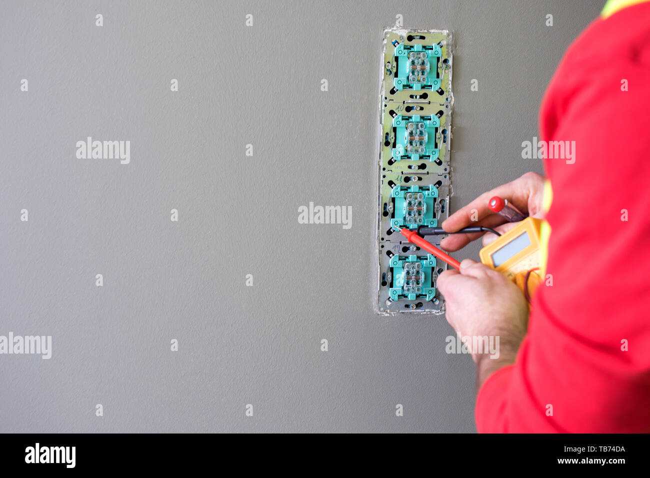 electrician at work, home renovation, electrical installation, Hand of ...