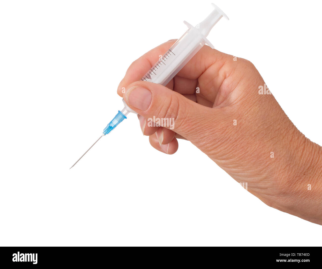 Woman's hand with plastic disposable, mono use syringe. About to jab ...