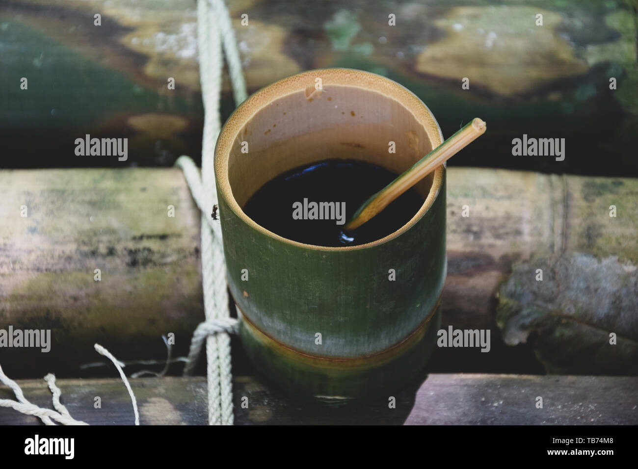 Fresh bio bamboo made cup and spoon filled with hot delicious hot ...