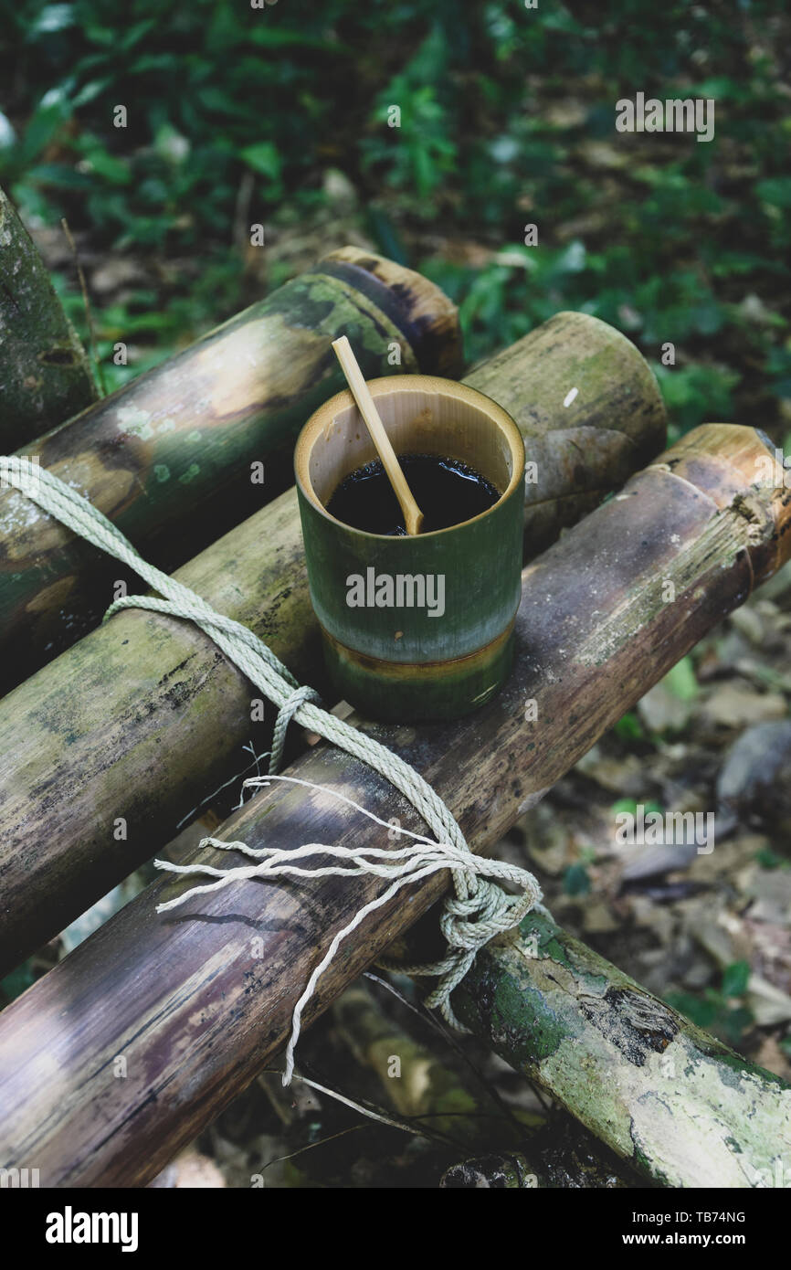 Fresh bio bamboo made cup and spoon filled with hot delicious hot ...