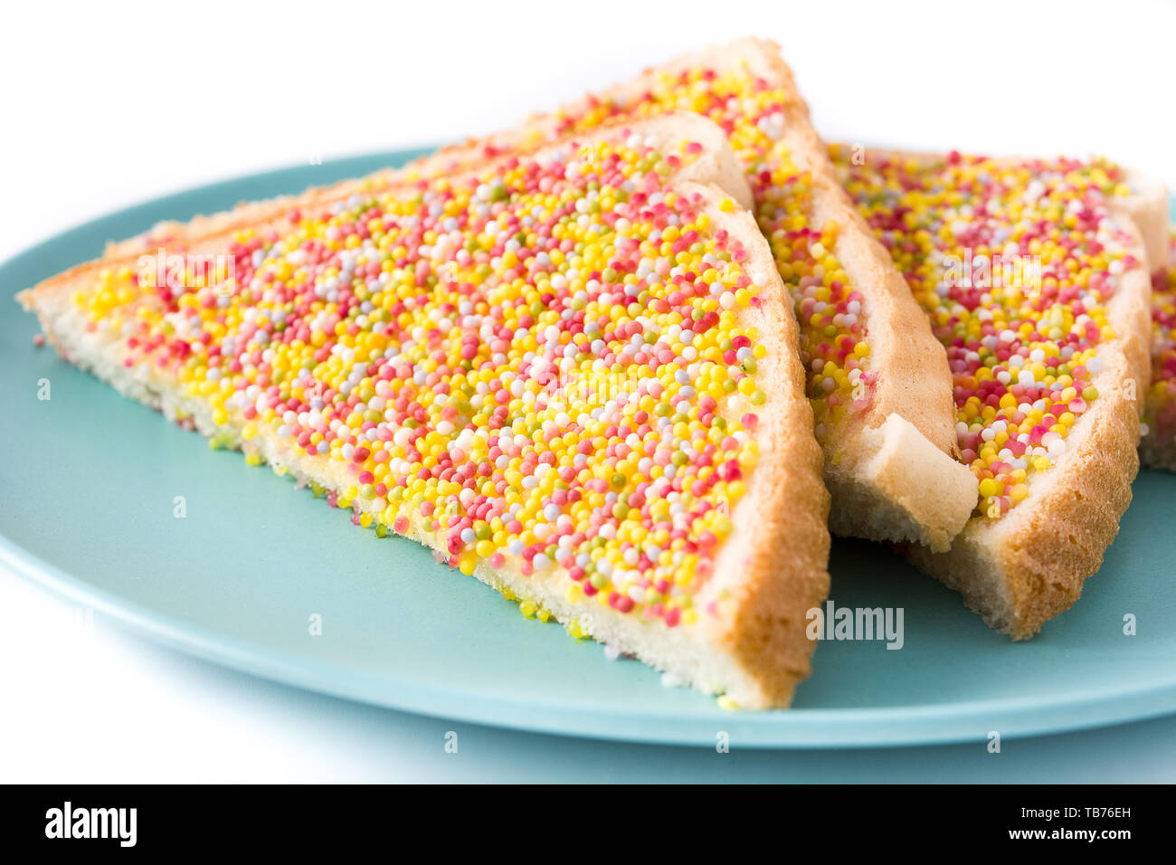 Traditional Australian fairy bread on plate isolated on white ...