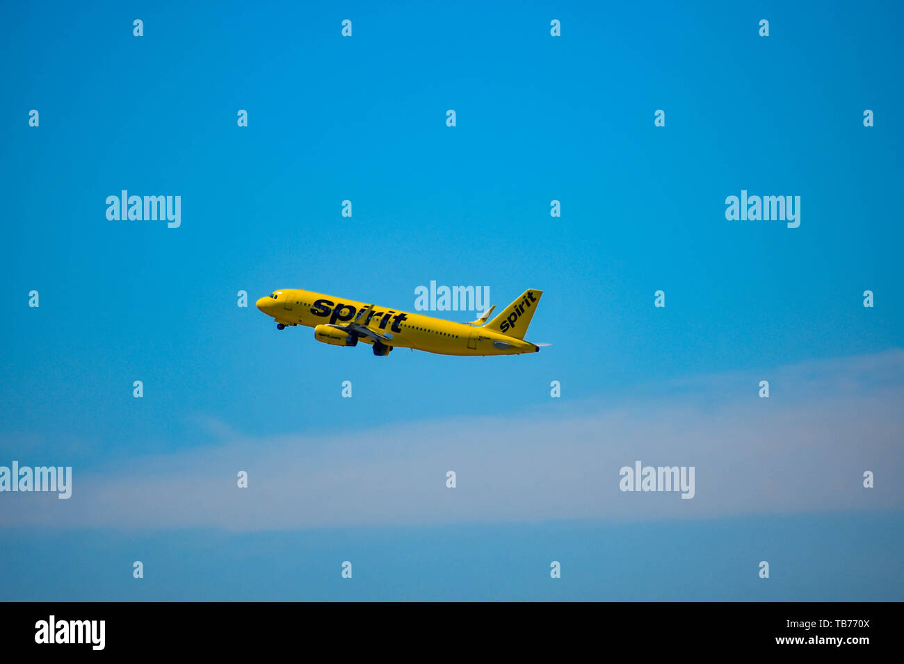Orlando, Florida. March 01, 2019. Spirit Airlines aircraft banking left ...