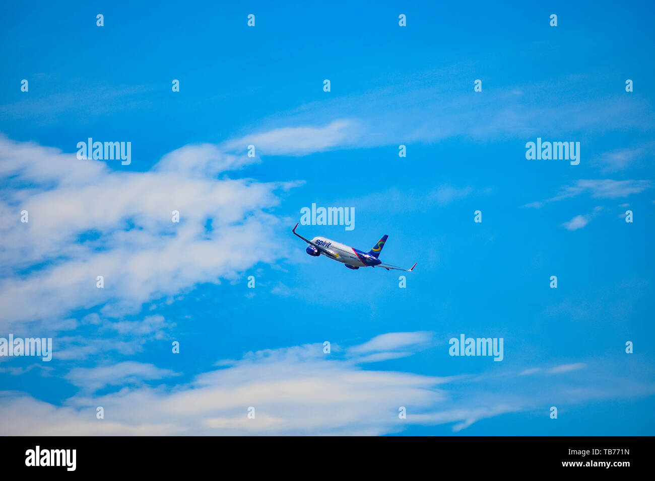 Orlando, Florida. March 01, 2019. Spirit Airlines aircraft banking left ...