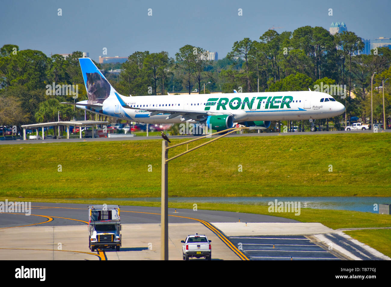 Orlando, Florida. March 02, 2019. Frontier aircraft on runway preparing ...