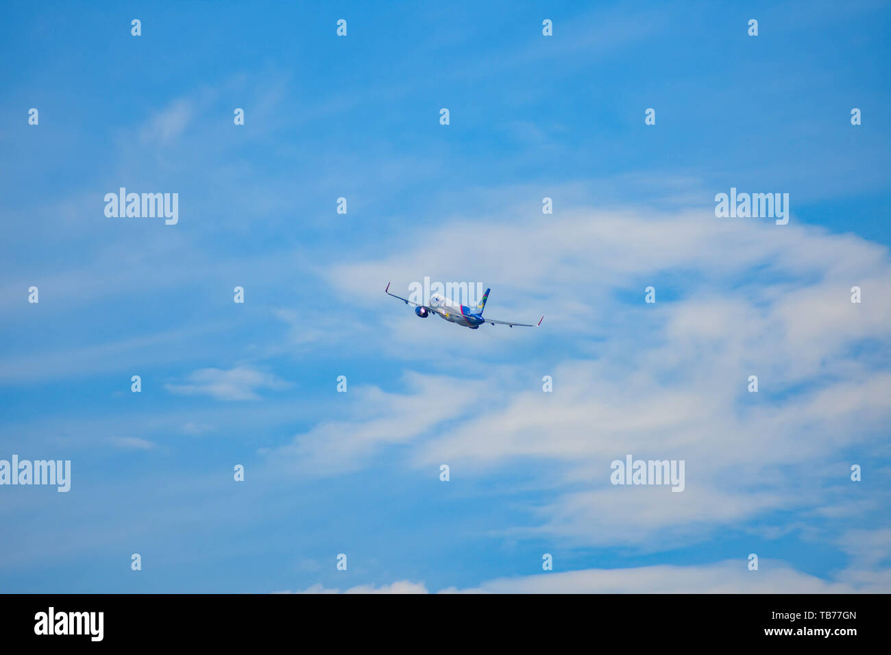 Orlando, Florida. March 02, 2019. Spirit Airlines aircraft banking left ...