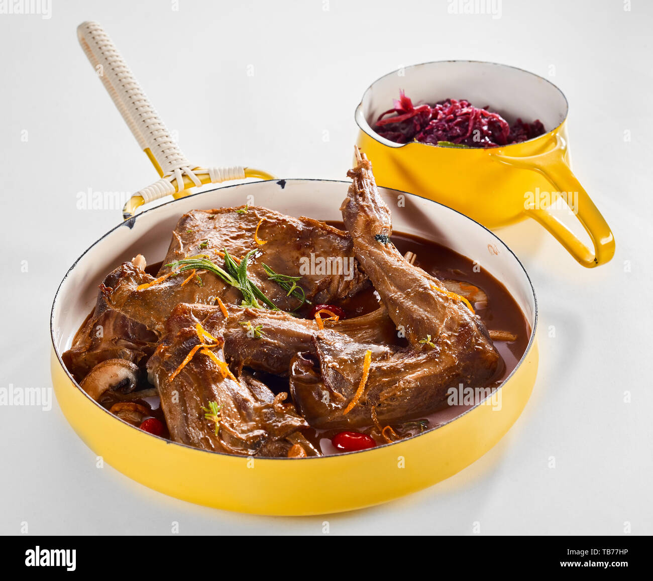 Portions of roasted wild rabbit flavored with orange zest, fresh herbs ...