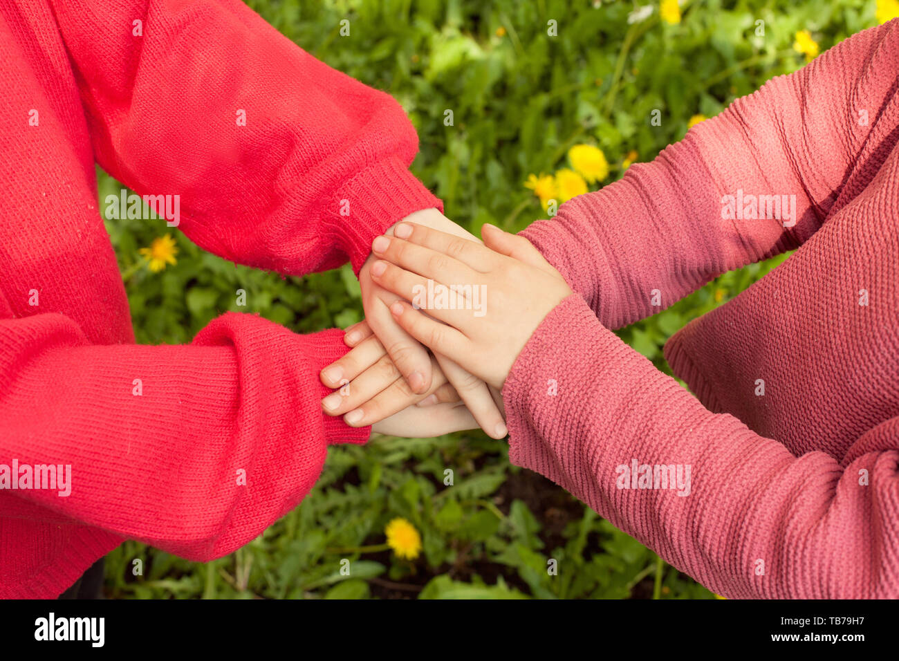 Kids Hands Together. Palm on palm hands friends Stock Photo - Alamy