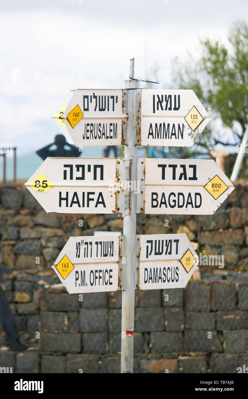 Sign indicating the distance to cities in the Middle East, in the Golan ...