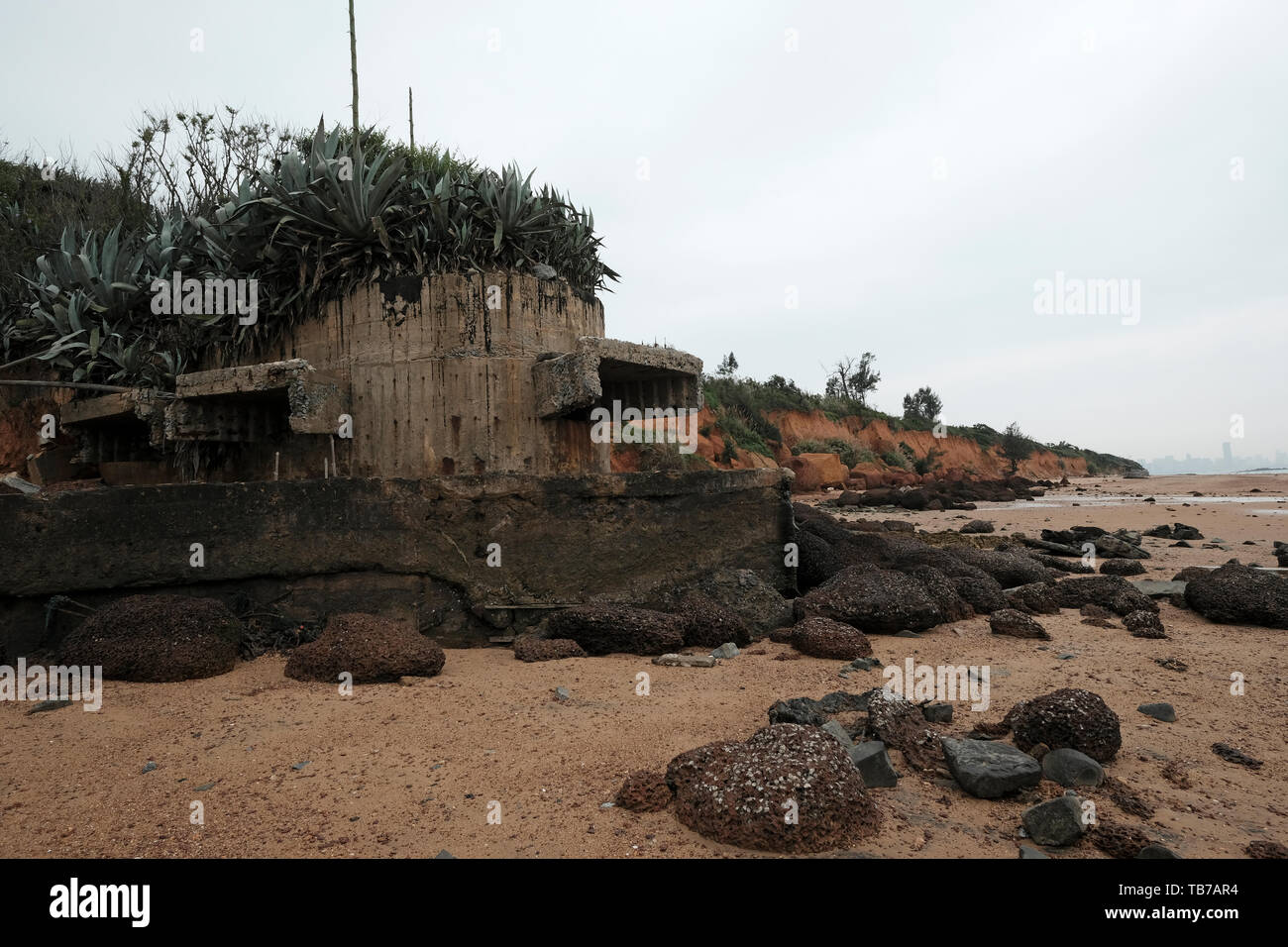 Abandoned and eroded military bunker on the northwestern shore of Lieyu ...