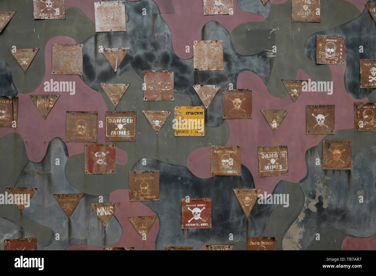 A collection of landmine warning signs from all over the world ...