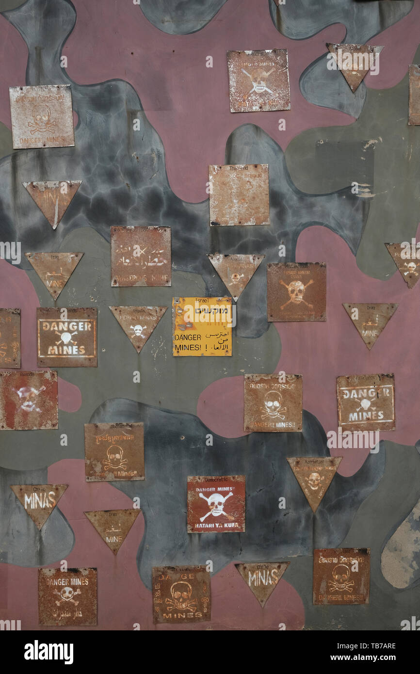 A collection of landmine warning signs from all over the world ...