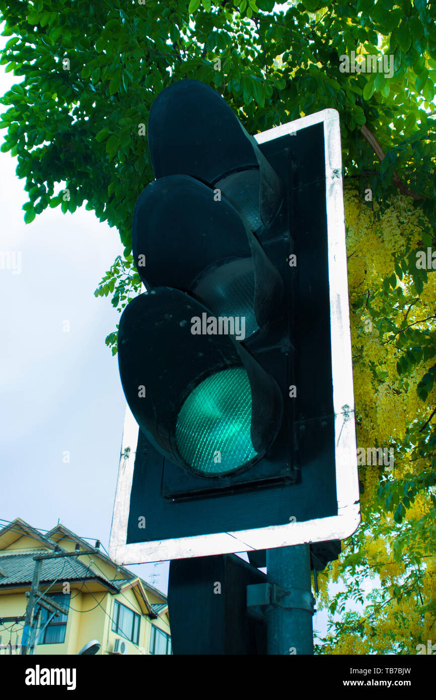Traffic light with green color in the city street High resolution image ...