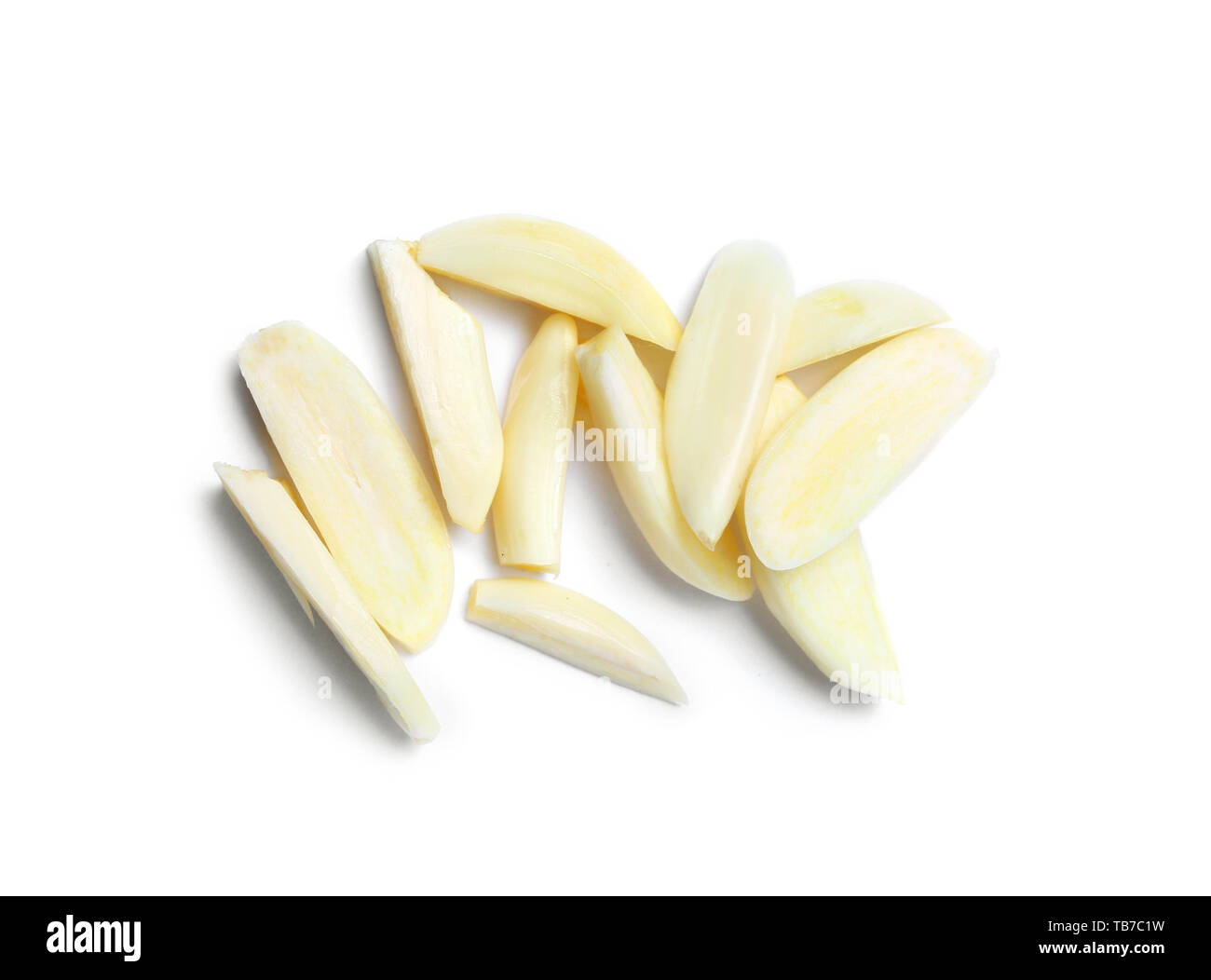 Cut garlic on white background Stock Photo - Alamy