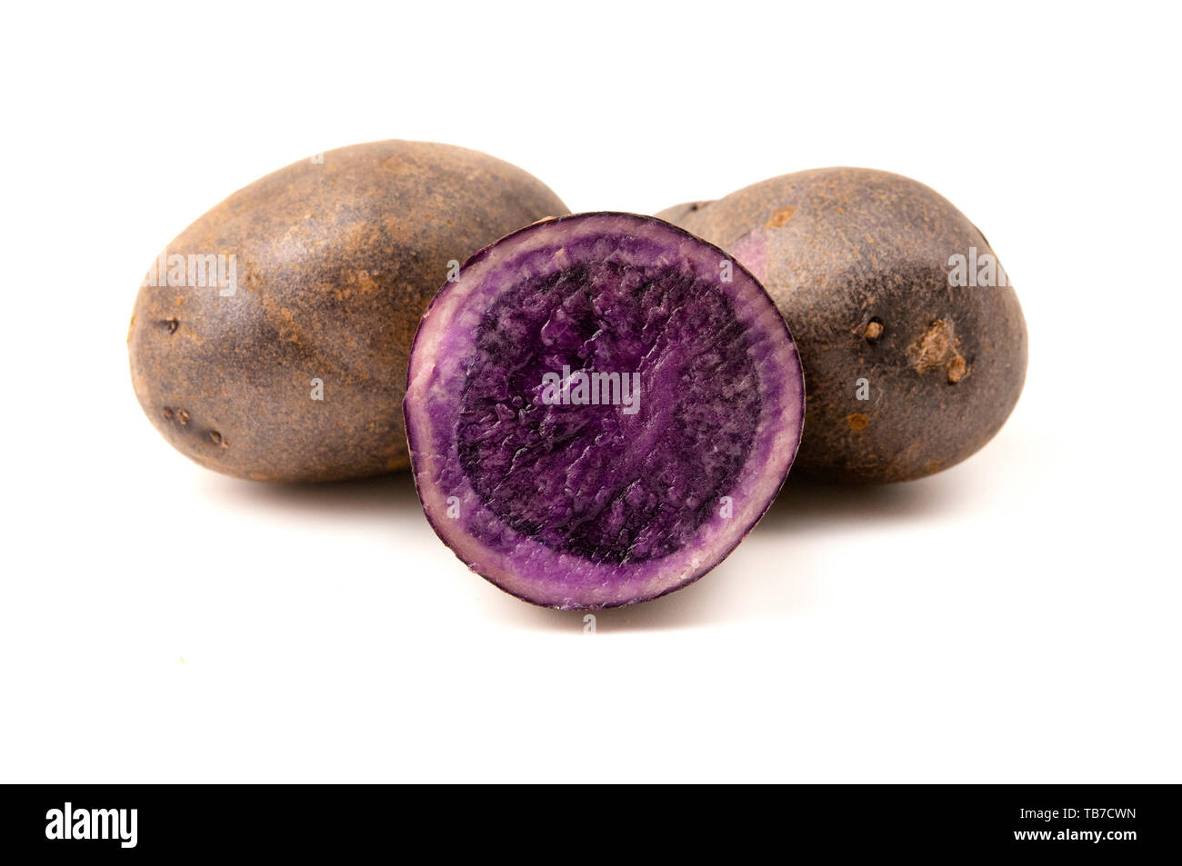 Prunelle Potatoes (Solanum tuberosum) on a white background Stock Photo ...