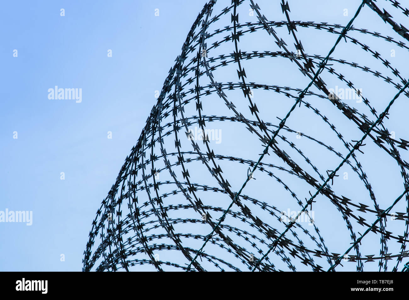protect metal wire curve in sky Stock Photo - Alamy