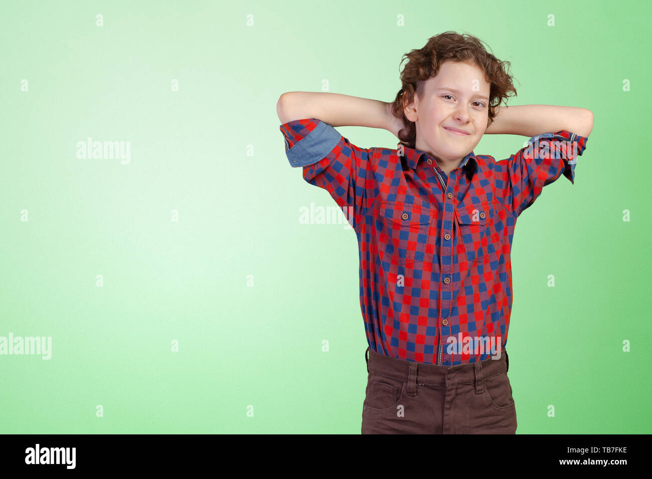 Portrait of little boy with hands folded Stock Photo - Alamy