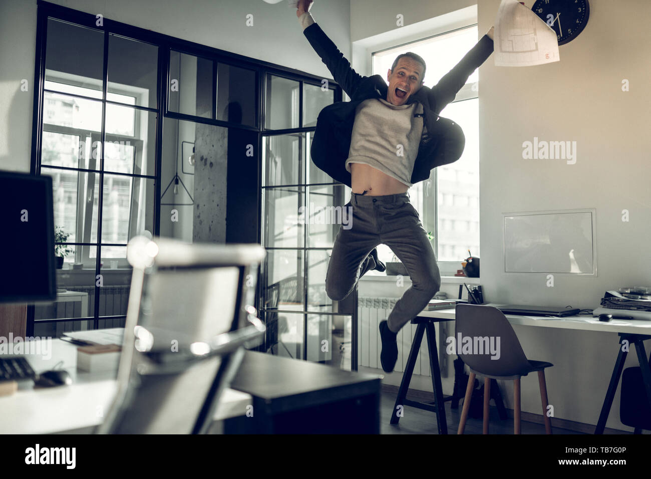 Happy high jump businessman hi-res stock photography and images - Alamy