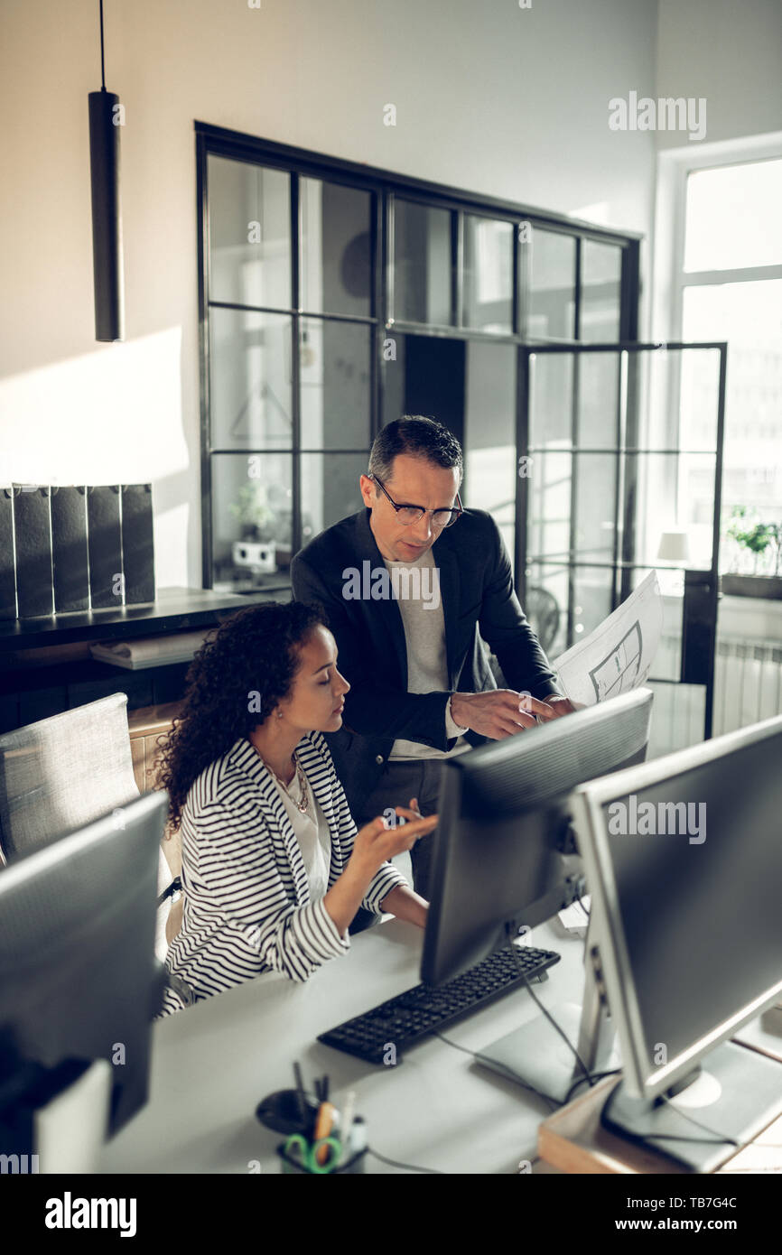 Boss secretary talking hi-res stock photography and images - Alamy