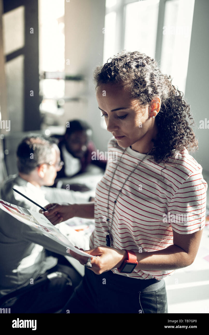 Curly secretary standing near hi-res stock photography and images - Alamy
