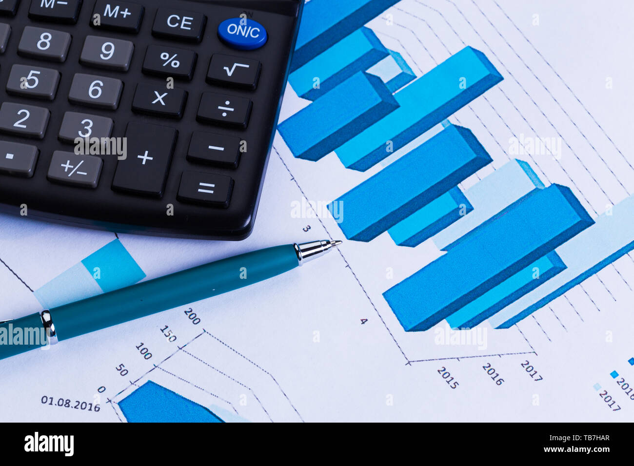 Graphs and Calculator Stock Photo - Alamy