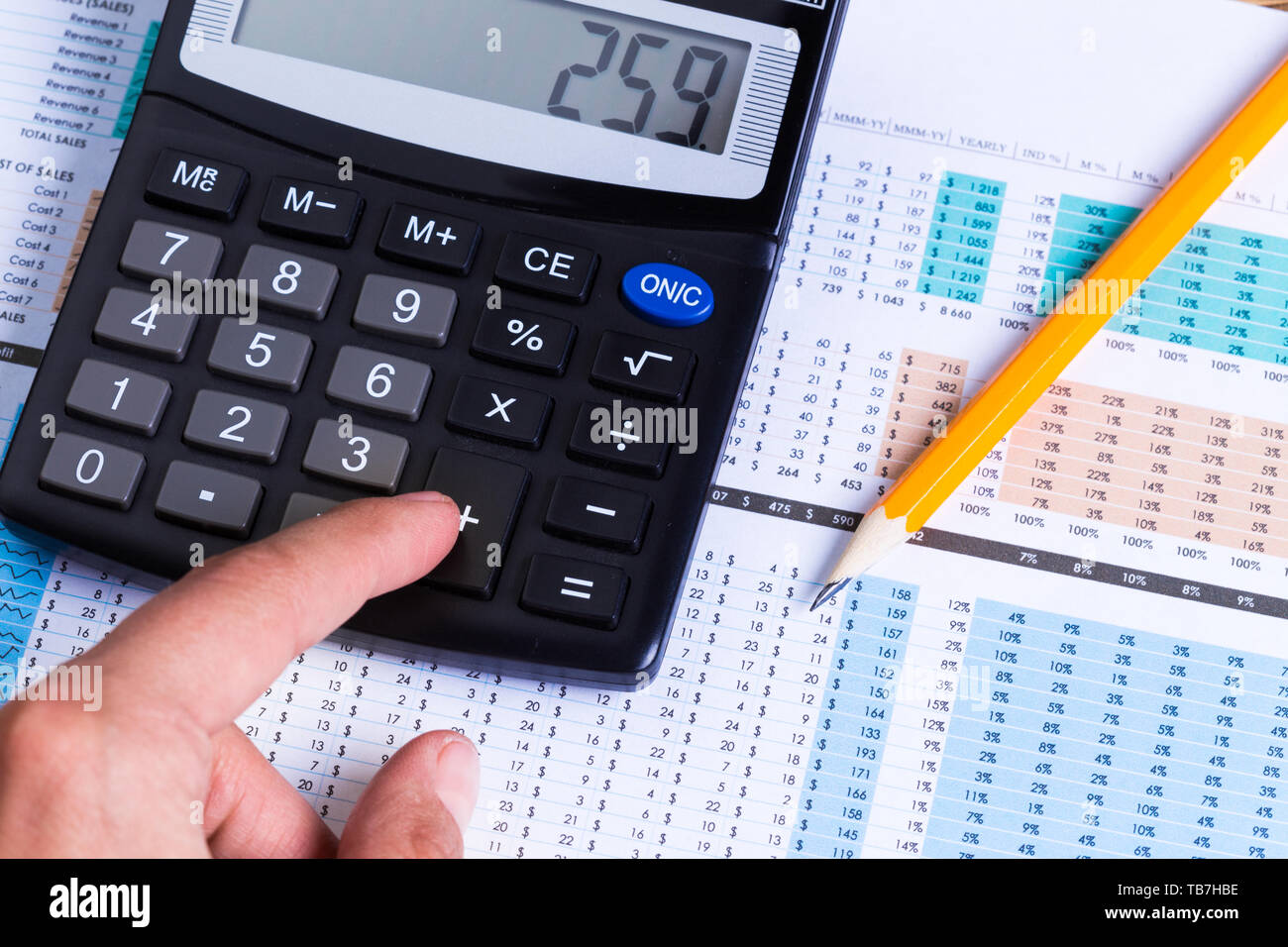Graphs and Calculator Stock Photo - Alamy